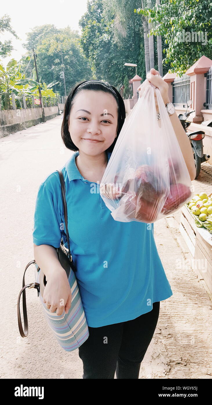 Plastic bag woman hi-res stock photography and images - Alamy