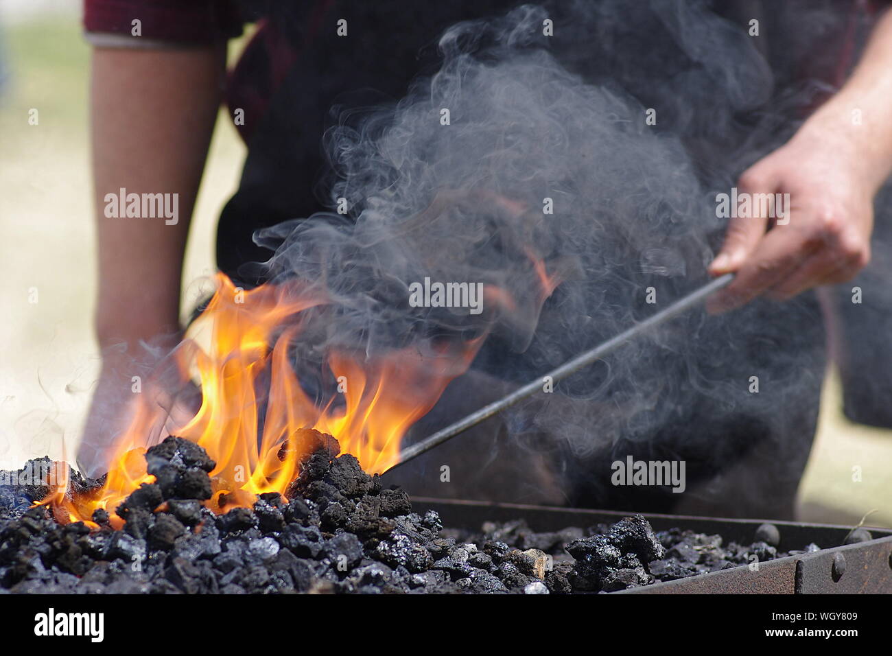 Man Holding Coal High Resolution Stock Photography and Images - Alamy