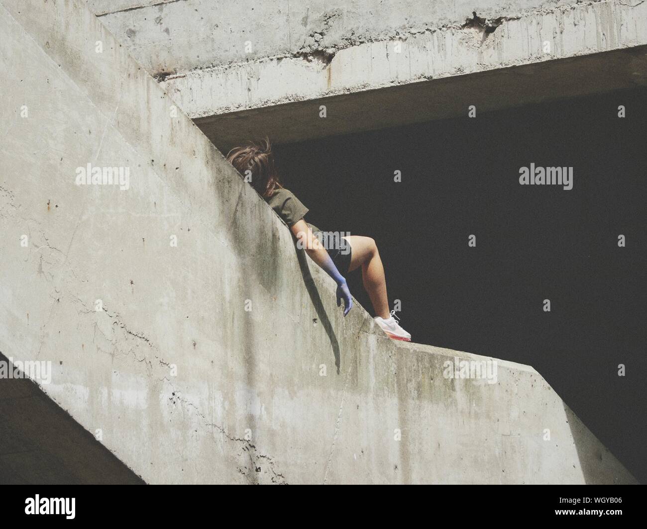 Girl Lying Wall High Resolution Stock Photography and Images - Alamy