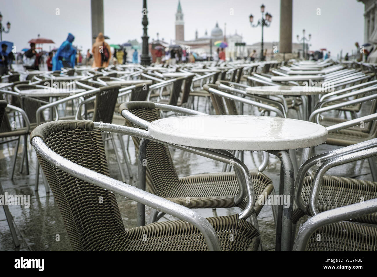 Empty tables and chairs in rain hi-res stock photography and images - Alamy