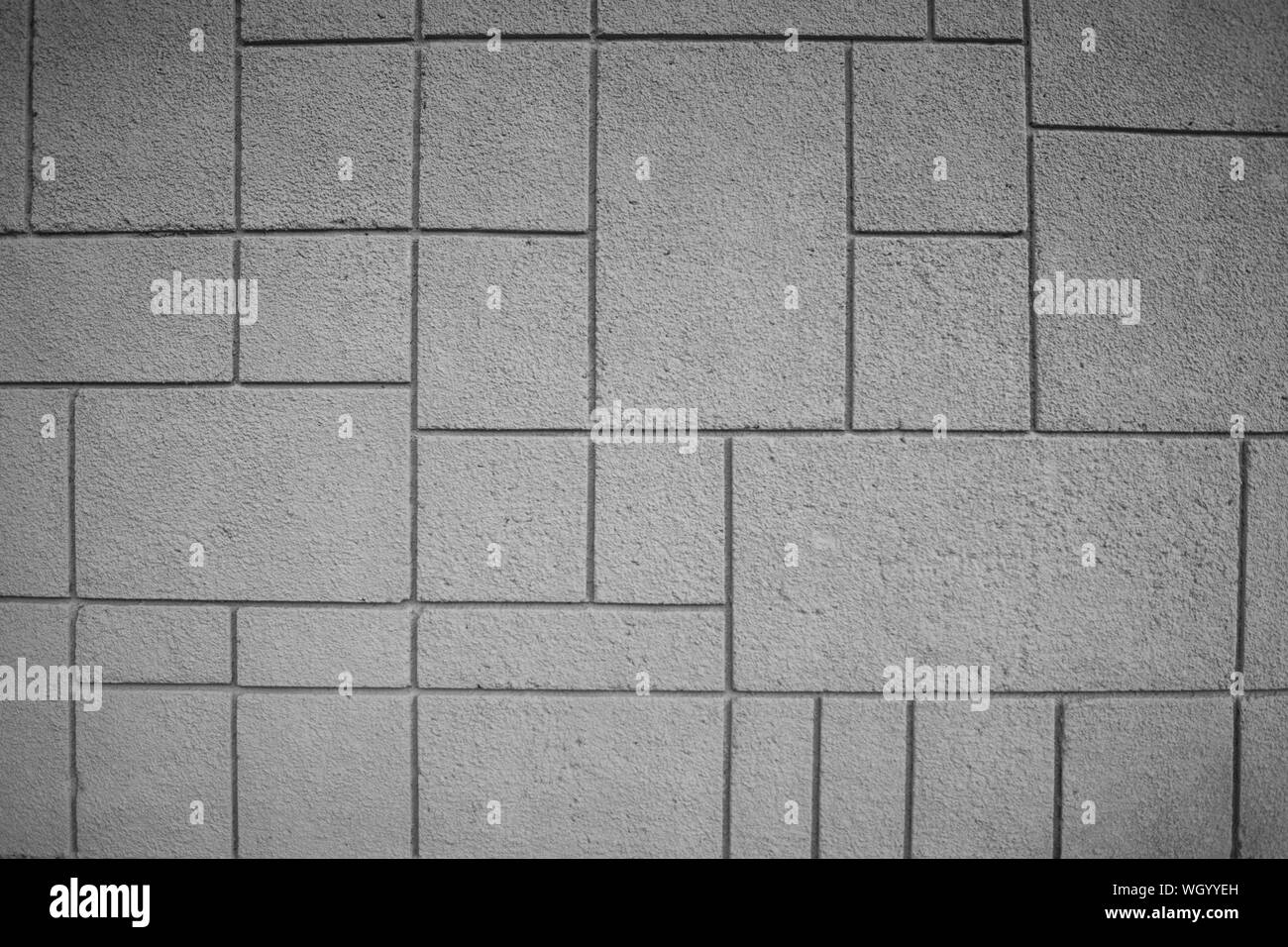 Pattern, pattern of white concrete blocks. Wall or sidewalk. rough ...