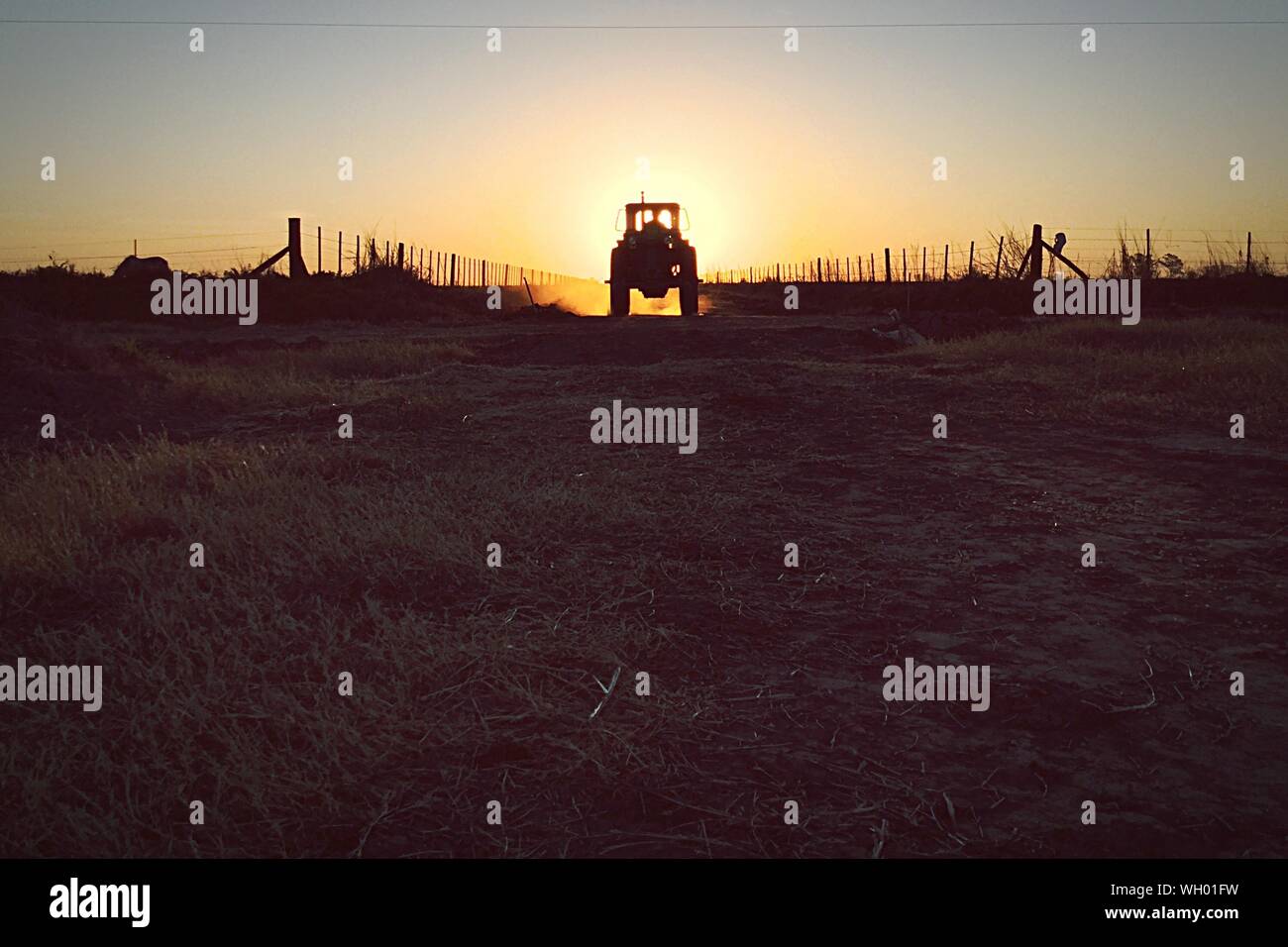 Scene Silhouette Sunset Tractor High Resolution Stock Photography and ...