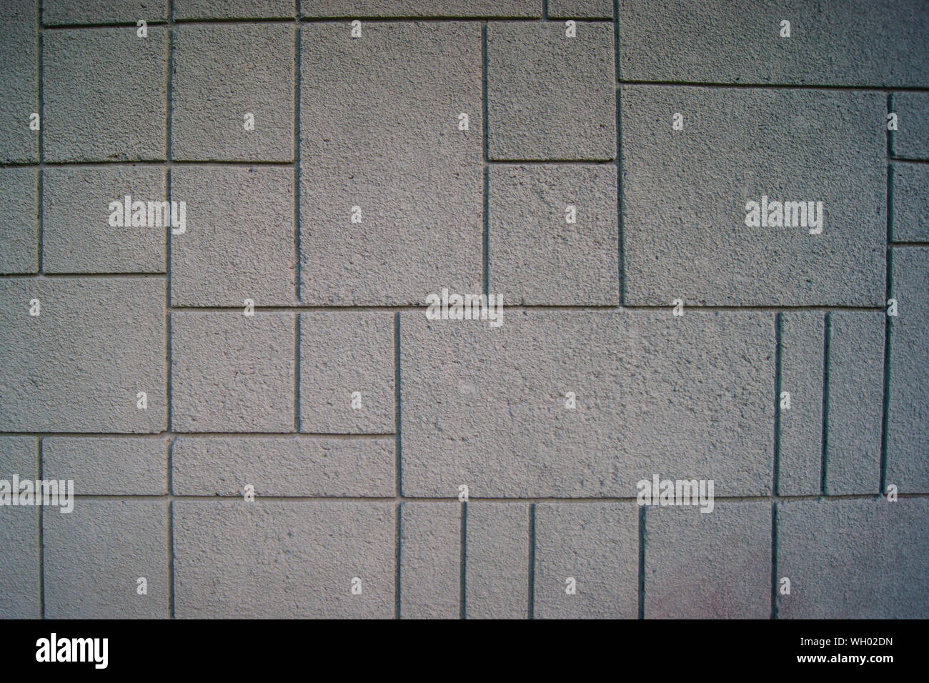 Pattern, pattern of white concrete blocks. Wall or sidewalk. rough ...