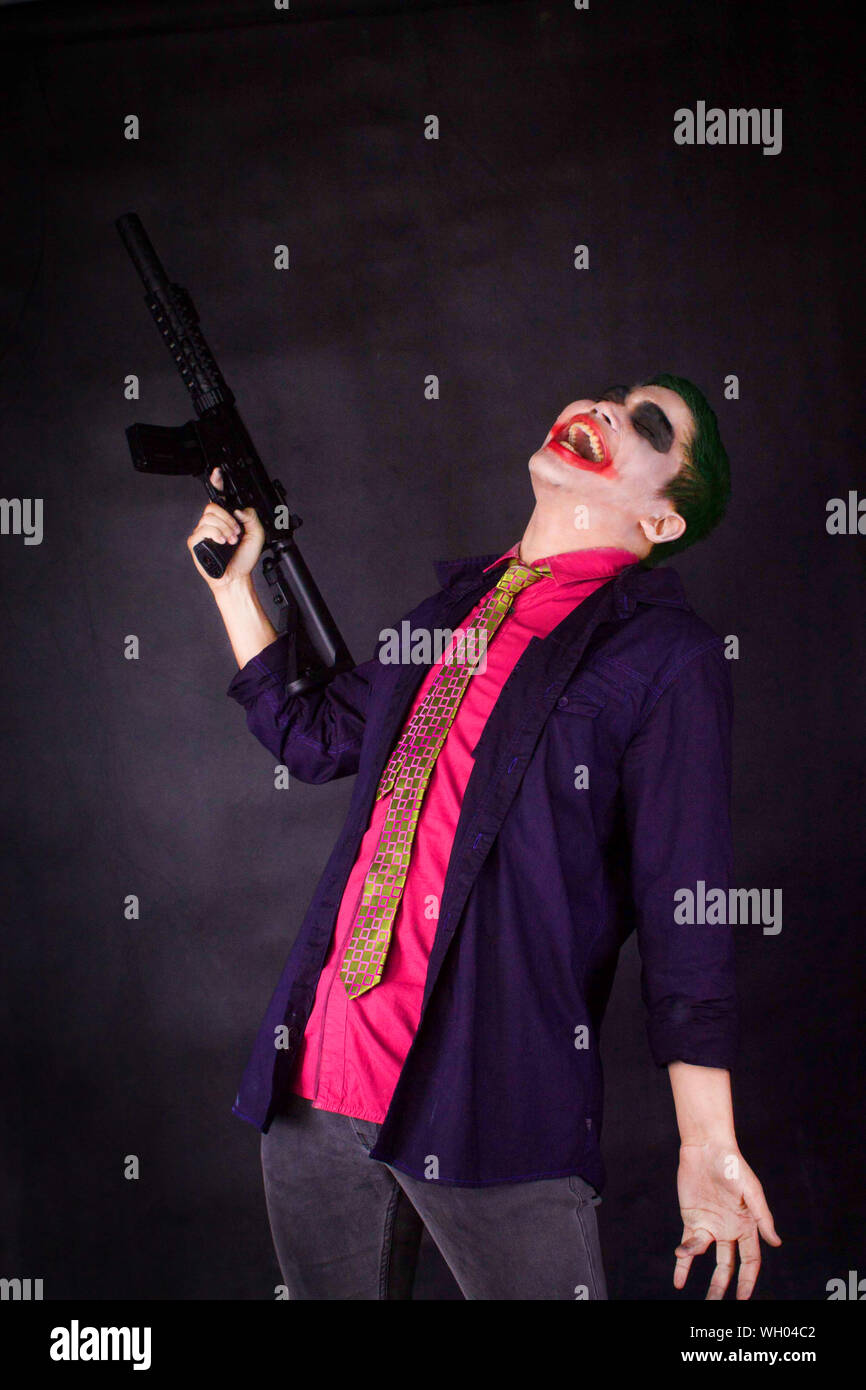 Young man gun hi-res stock photography and images - Alamy