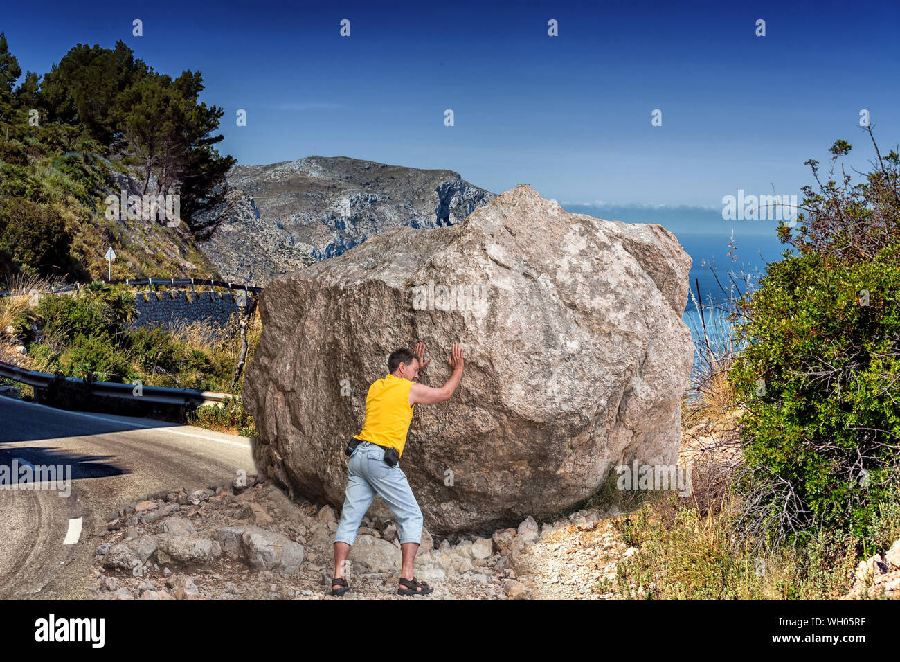 Pushing Boulder High Resolution Stock Photography and Images - Alamy