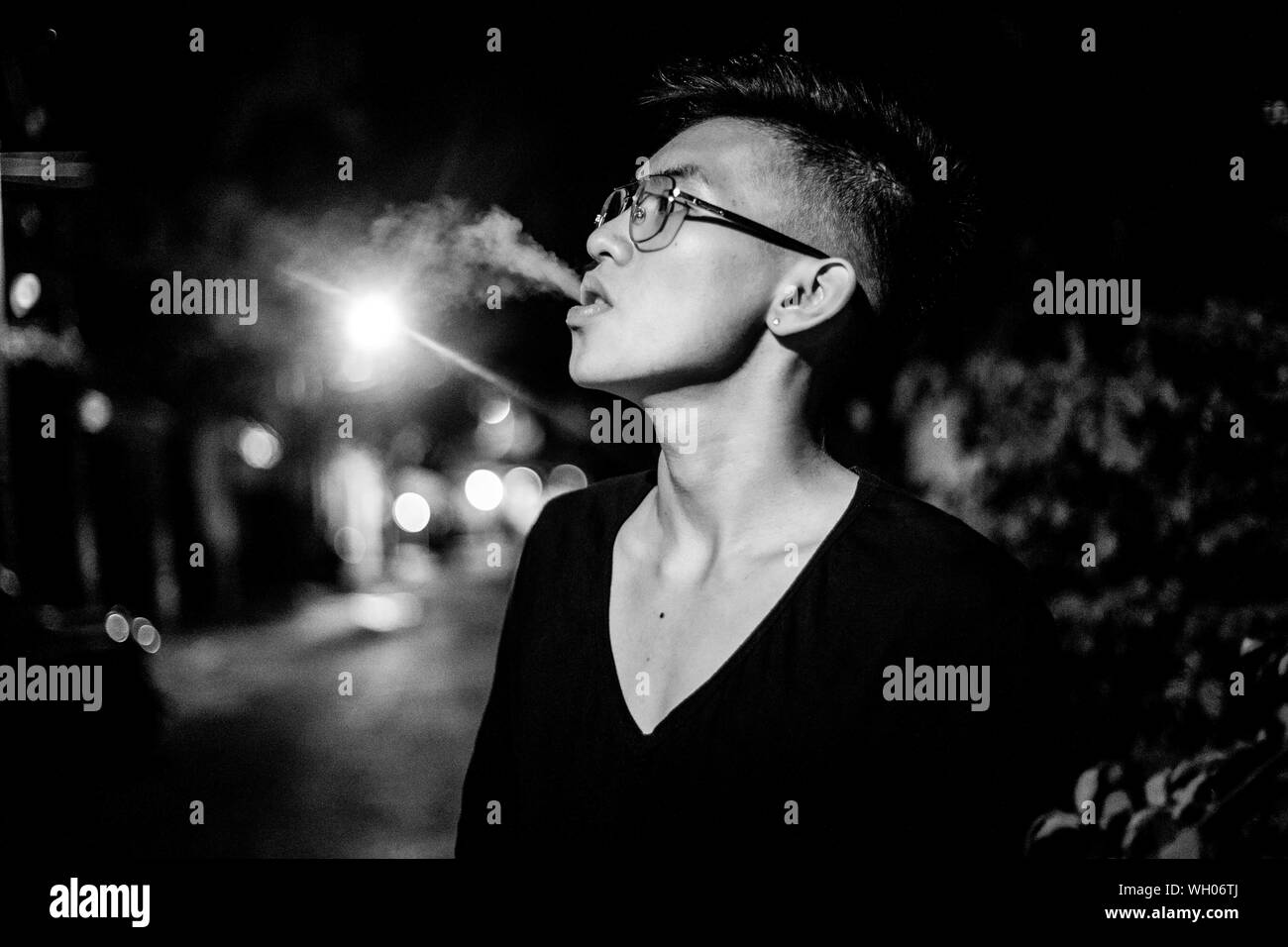 Cigarette boys Black and White Stock Photos & Images - Alamy