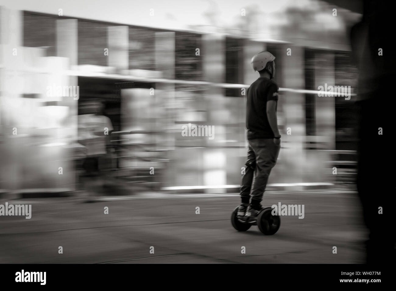 Person on electric unicycle hi-res stock photography and images - Alamy