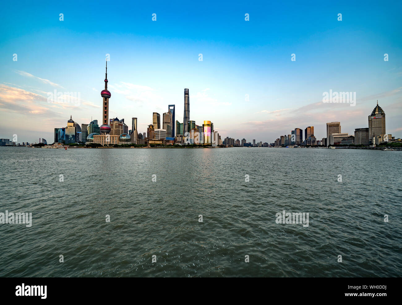 Shanghai skyline at sunset Stock Photo - Alamy