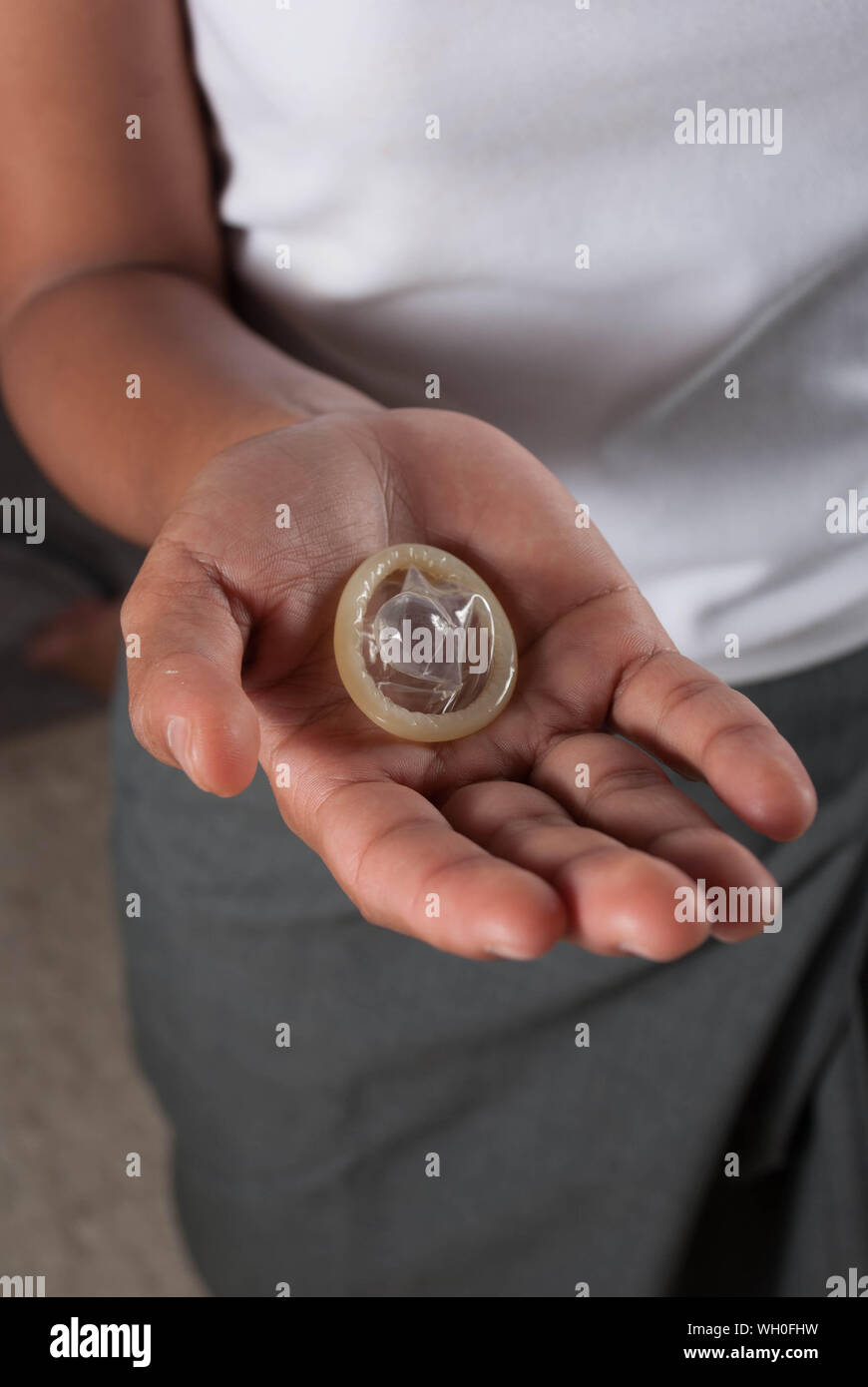 Holding condom hi-res stock photography and images - Alamy