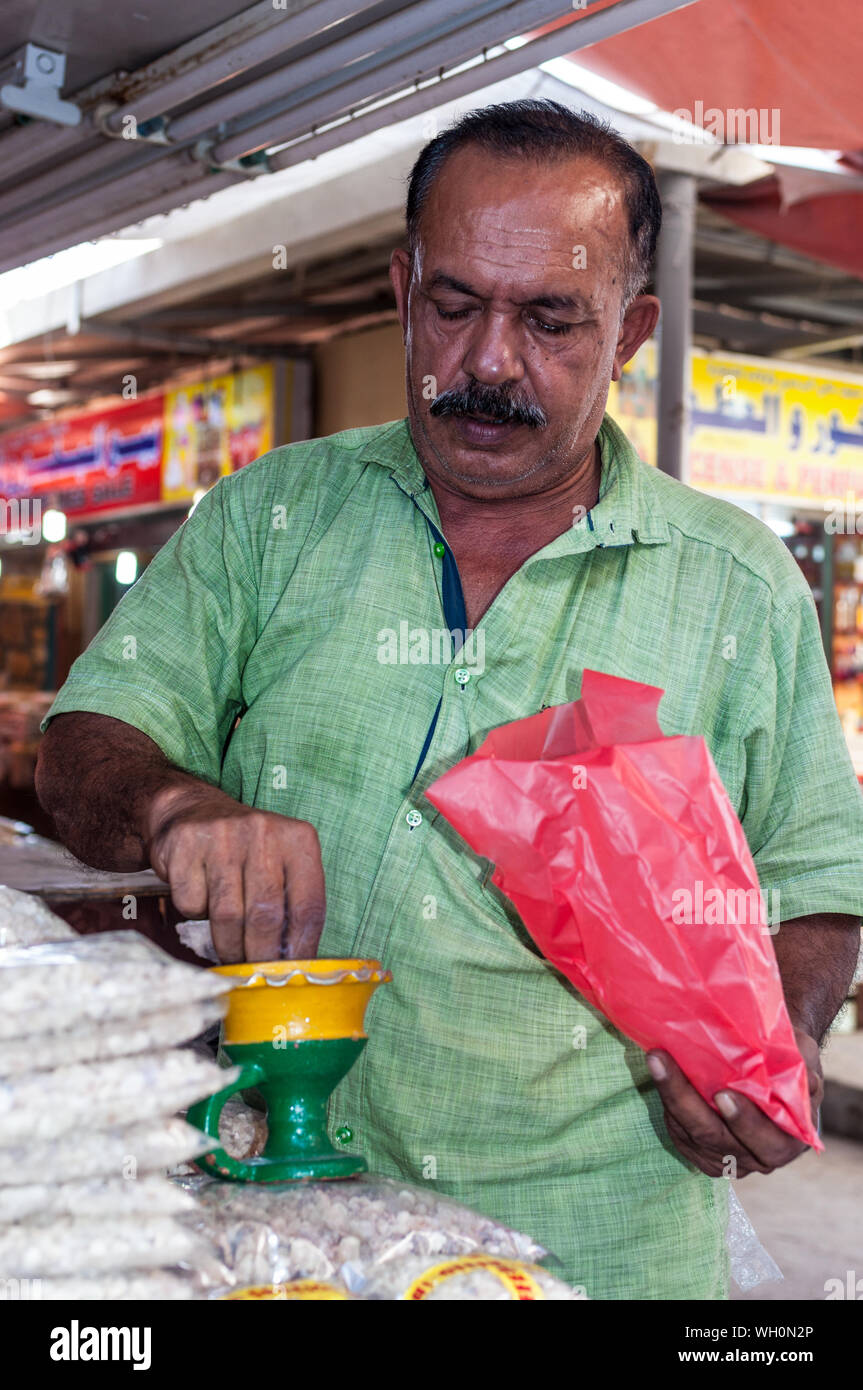 Salalah, Sultanat of Oman - November 12, 2017: Man selling frankincense ...