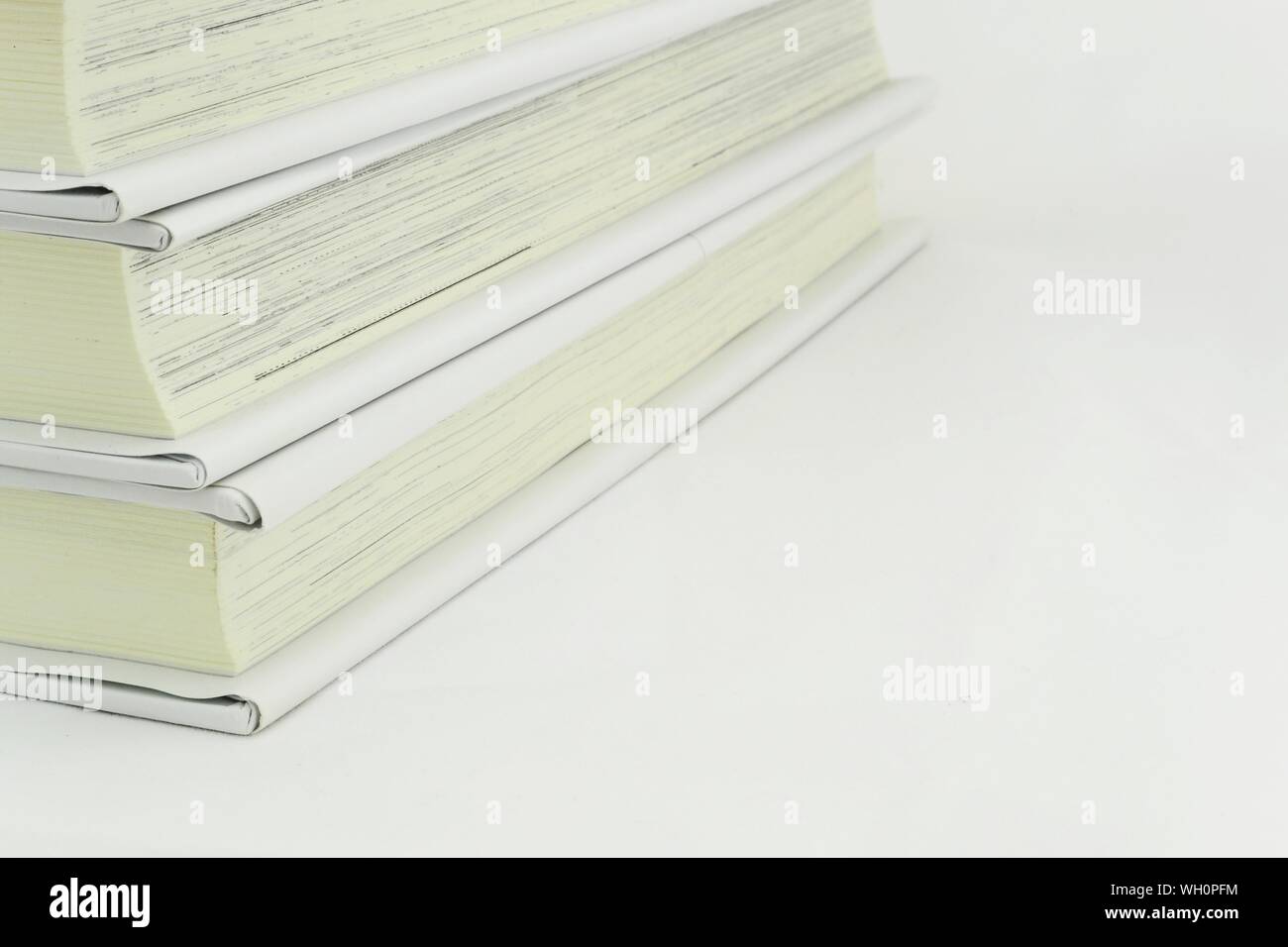 Stack Of Books Against White Background Stock Photo - Alamy