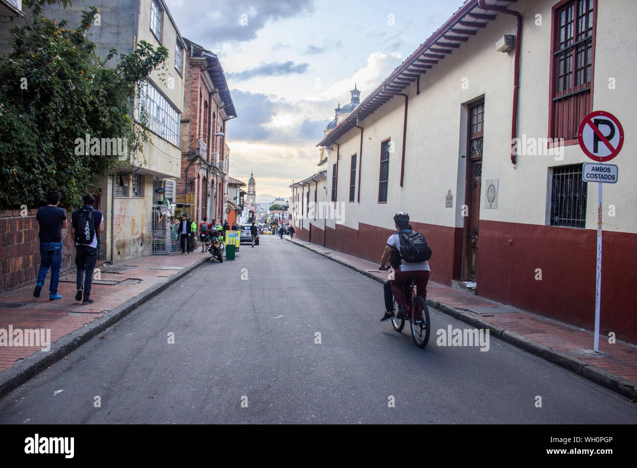Man Riding Bicycle On Street In City Stock Photo - Alamy
