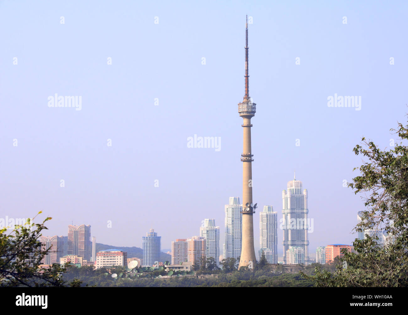 Aerial view of houses in new residential complex and Pyongyang TV Tower ...
