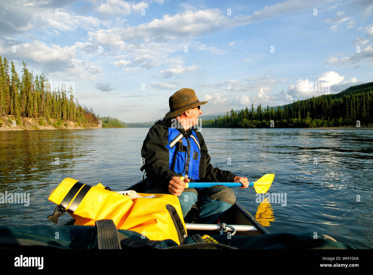 Canoe with three men hi-res stock photography and images - Alamy