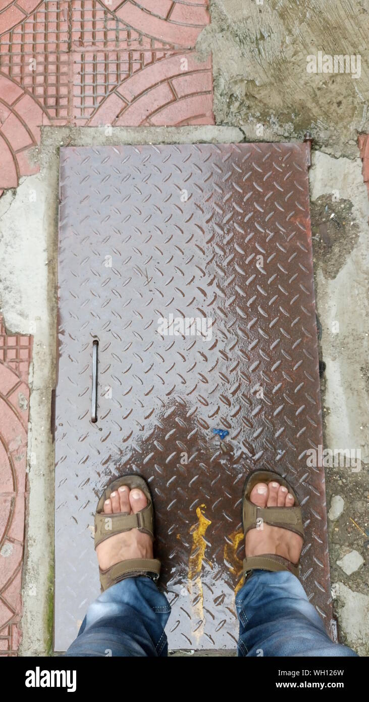 Wet manhole High Resolution Stock Photography and Images - Alamy