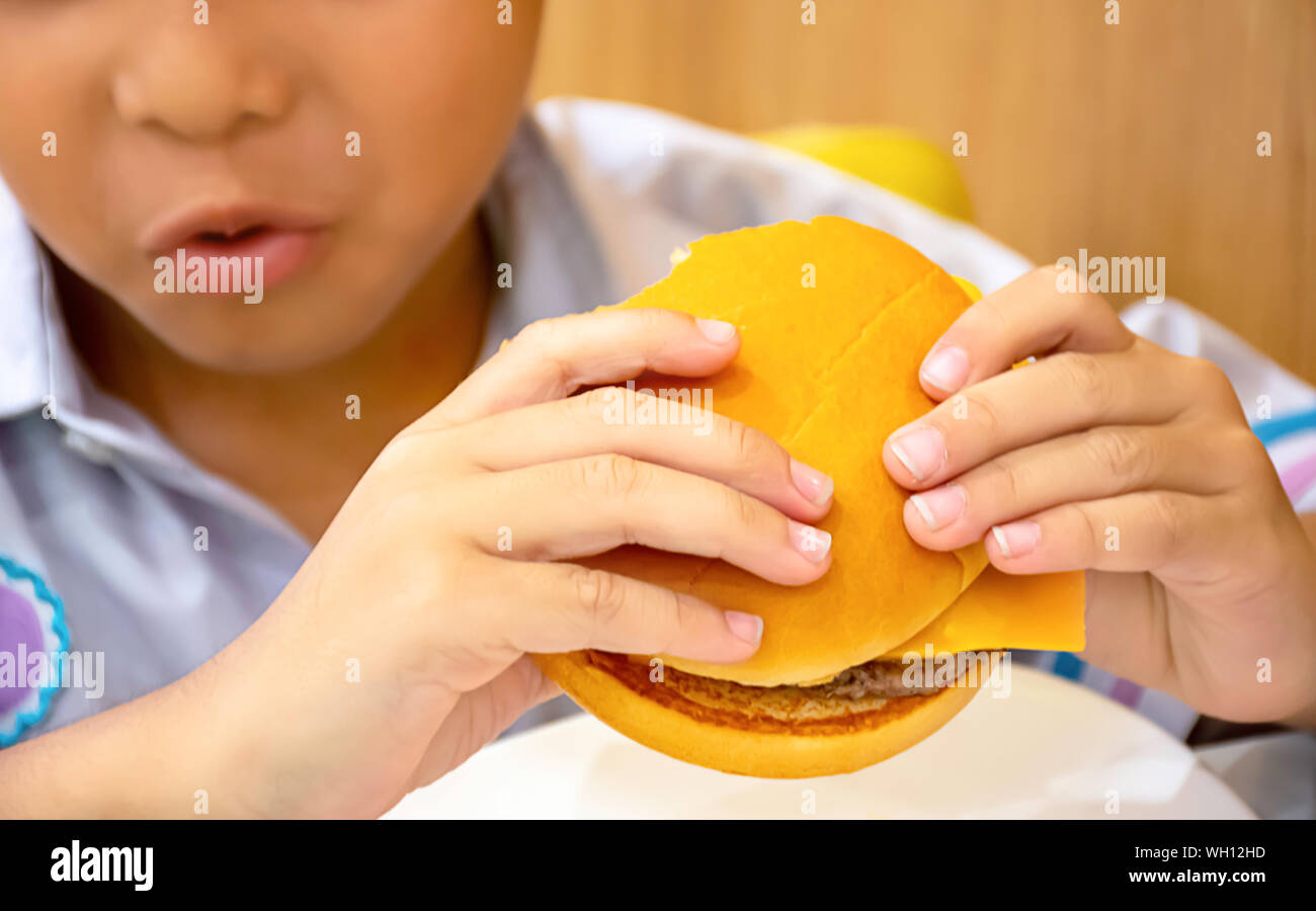 Fat kid hi-res stock photography and images - Alamy