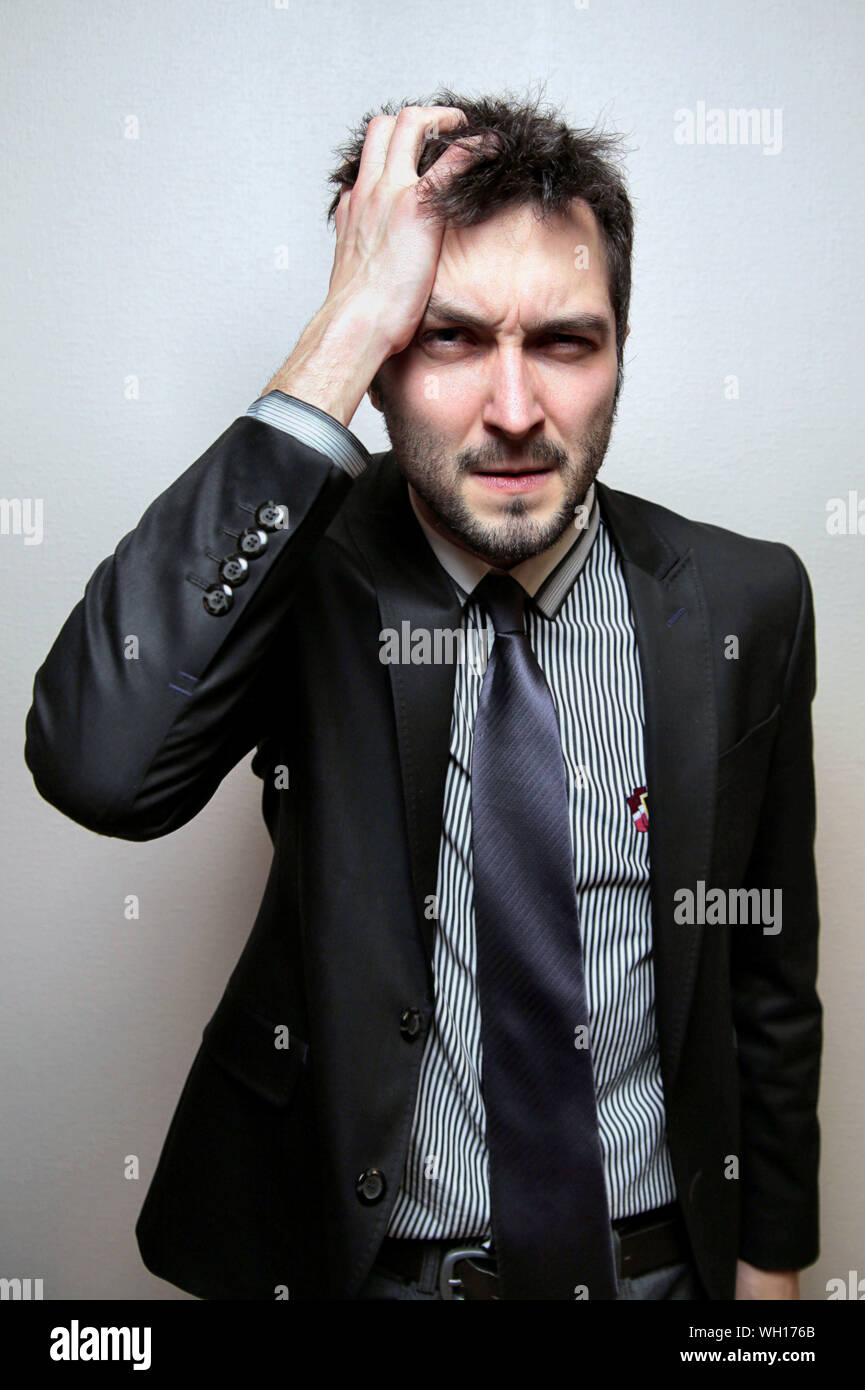 Holding head hi-res stock photography and images - Alamy