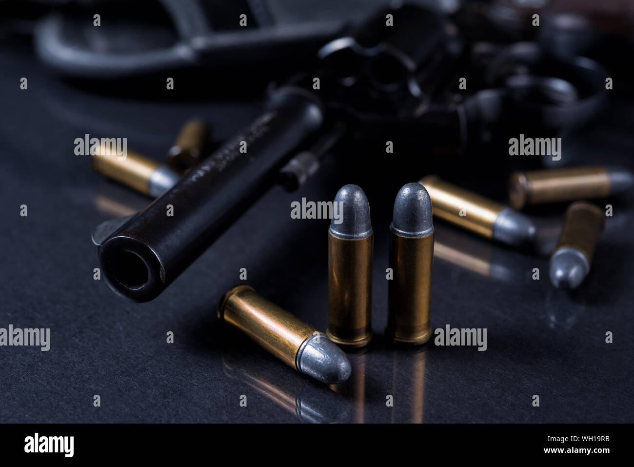 Pistol bullet gun table hi-res stock photography and images - Alamy