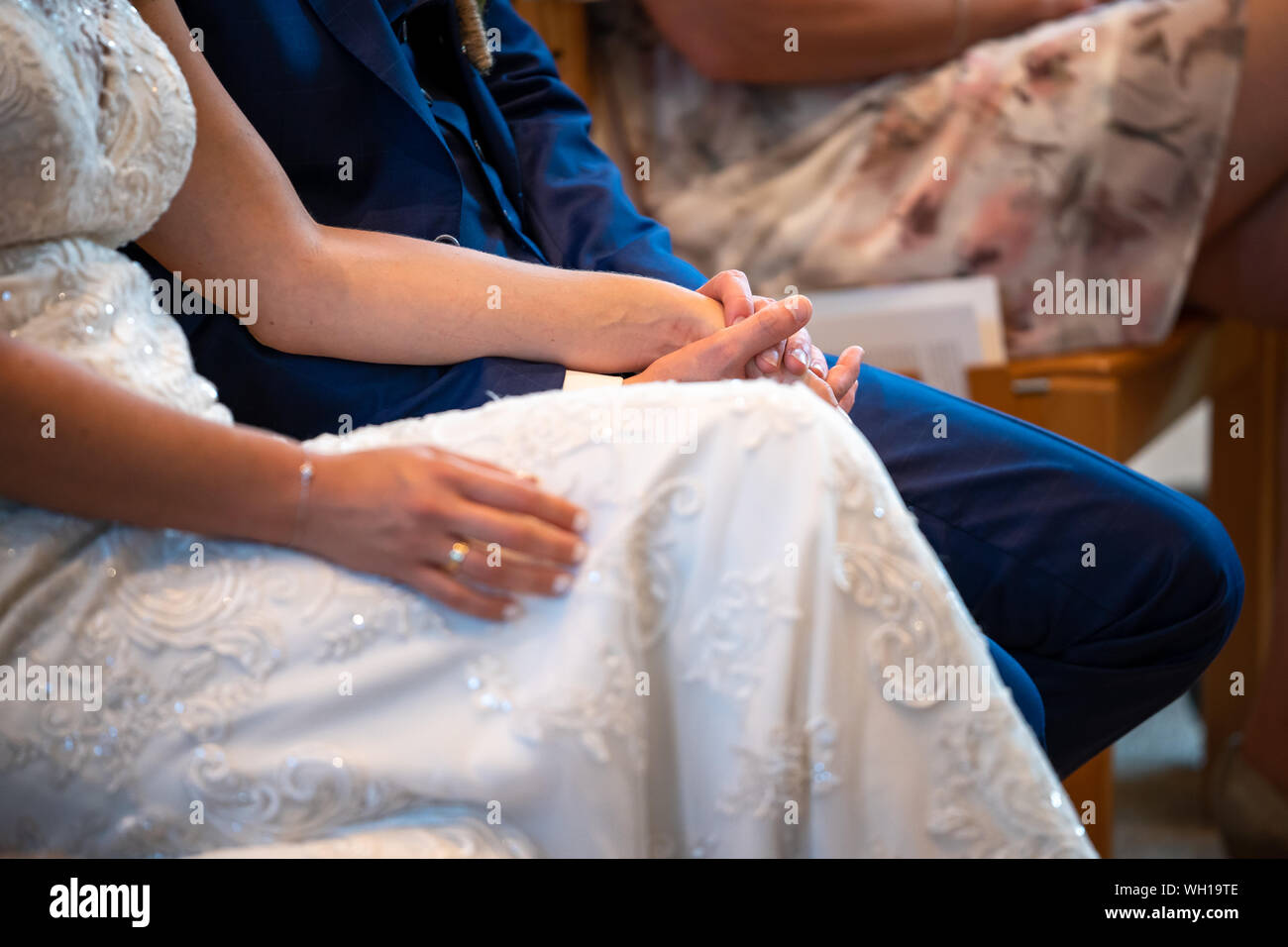 Bride and groom holding their hands during beautiful wedding ceremony ...