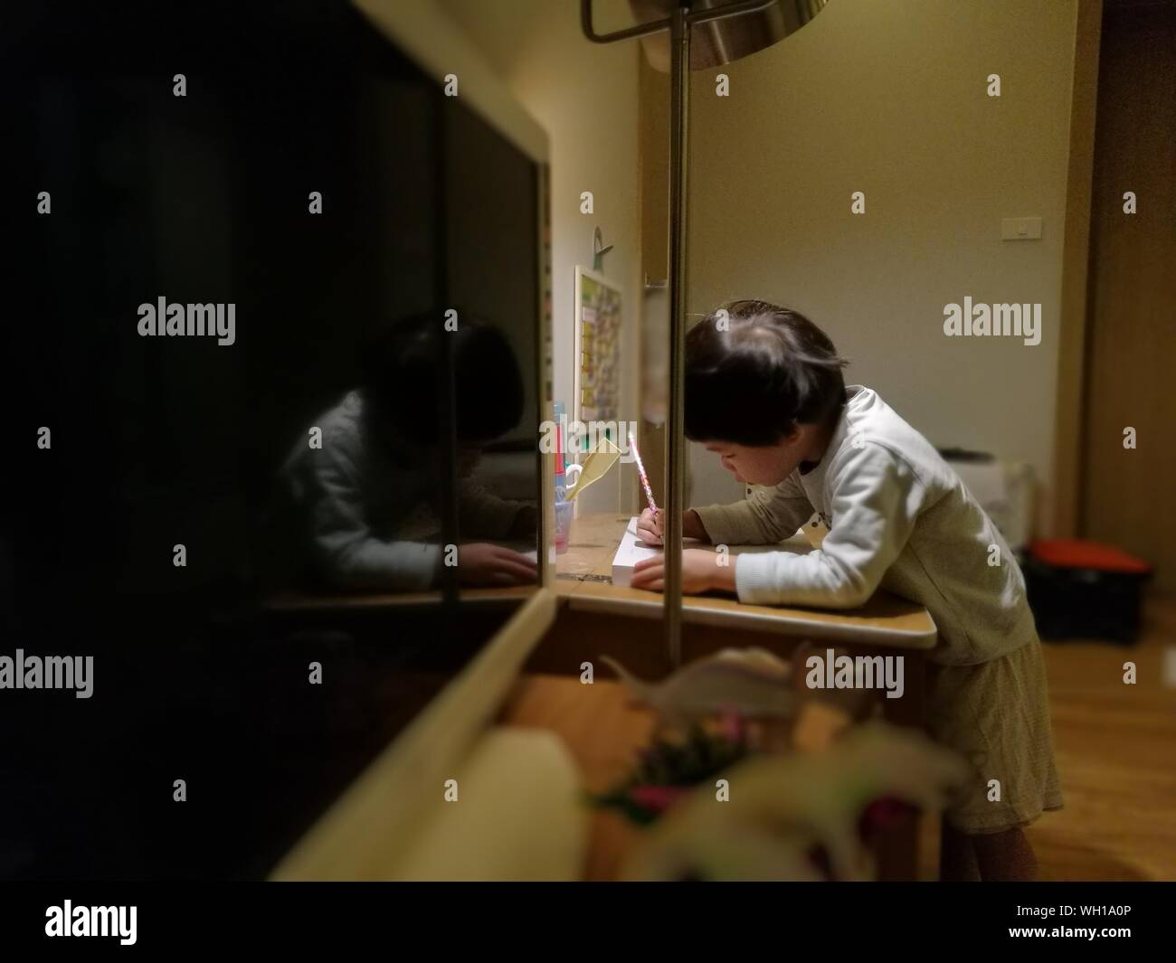 Child writing hi-res stock photography and images - Alamy