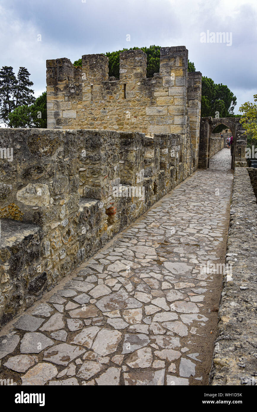 Lisbon, Portugal - July 27, 2019: External wall and towers of the ...