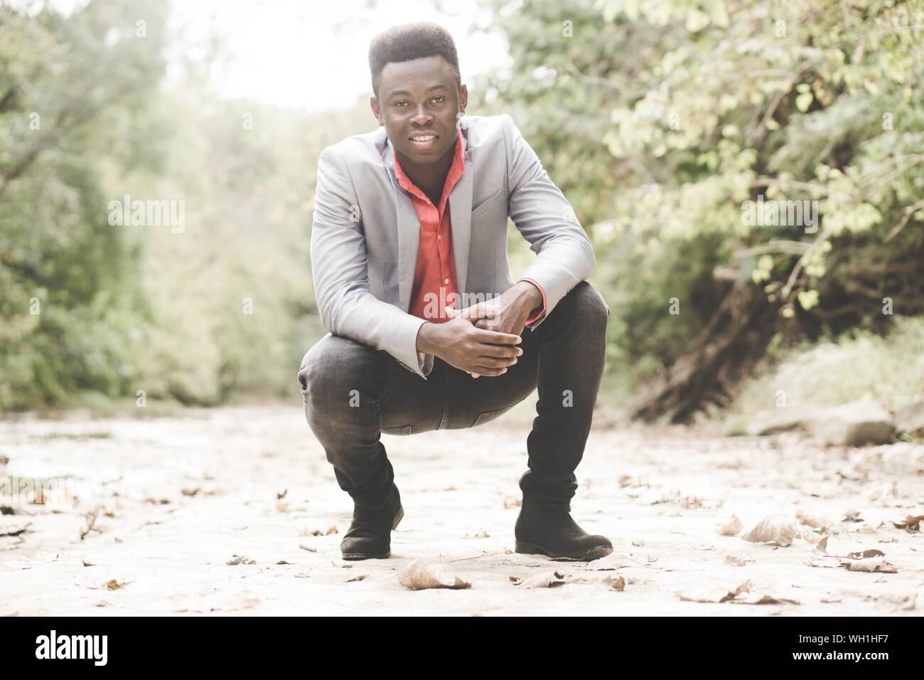 Smiling man in suit hi-res stock photography and images - Alamy