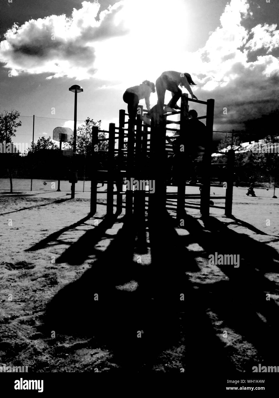 Children playing on playground jungle gym hi-res stock photography and images - Alamy