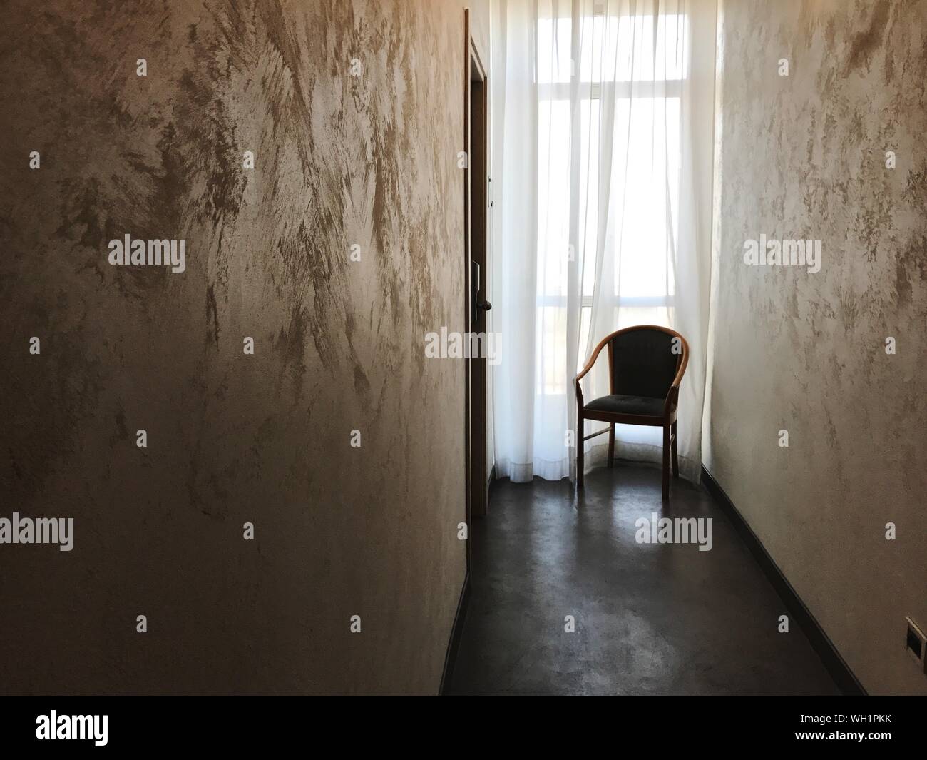 Corridor chair hi-res stock photography and images - Alamy