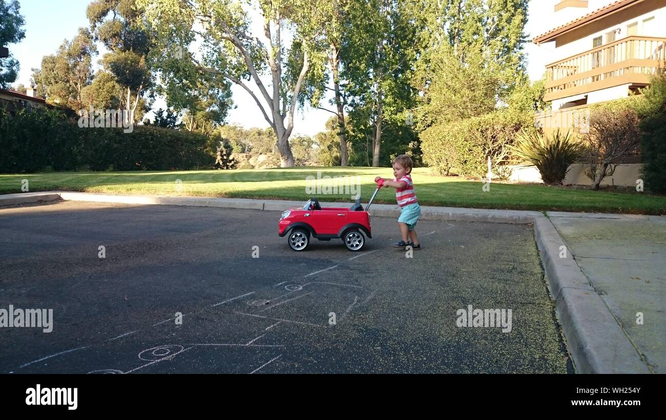 Toddler pushing toy hi-res stock photography and images - Alamy
