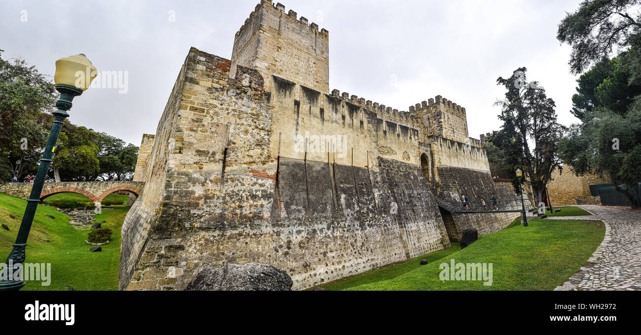 Lisbon, Portugal - July 27, 2019: External wall and towers of the ...