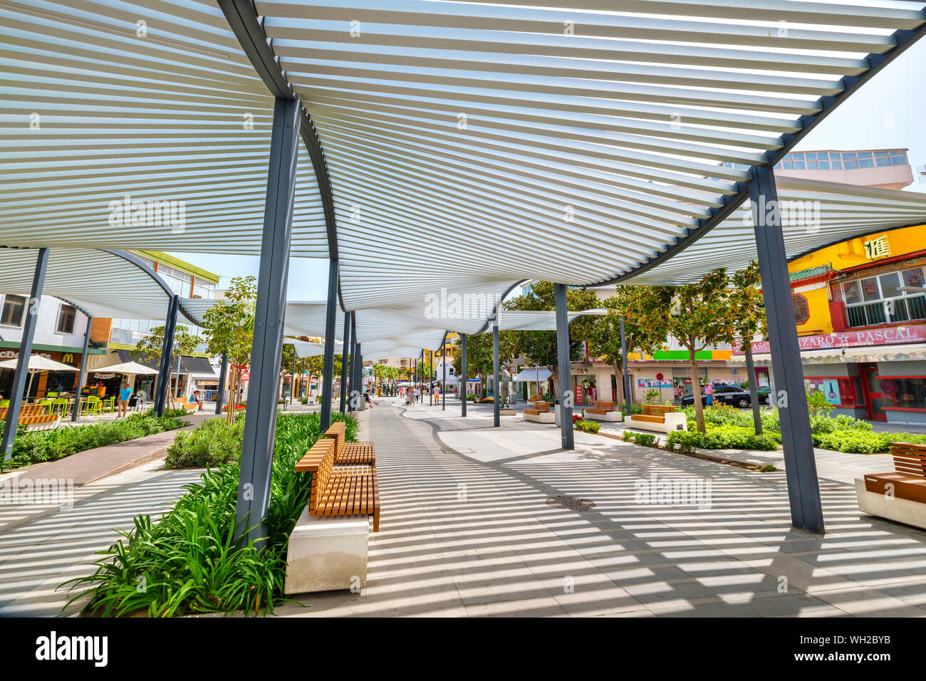 Modern sun shades above the Costa del Sol square at the center of ...