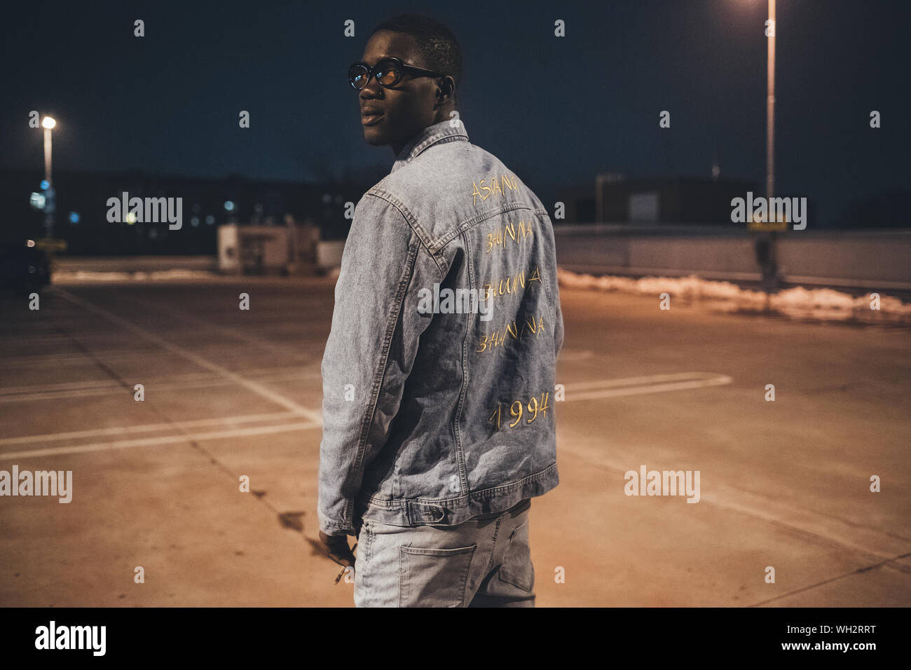 young black man posing and showing his back – youth, new generation ...