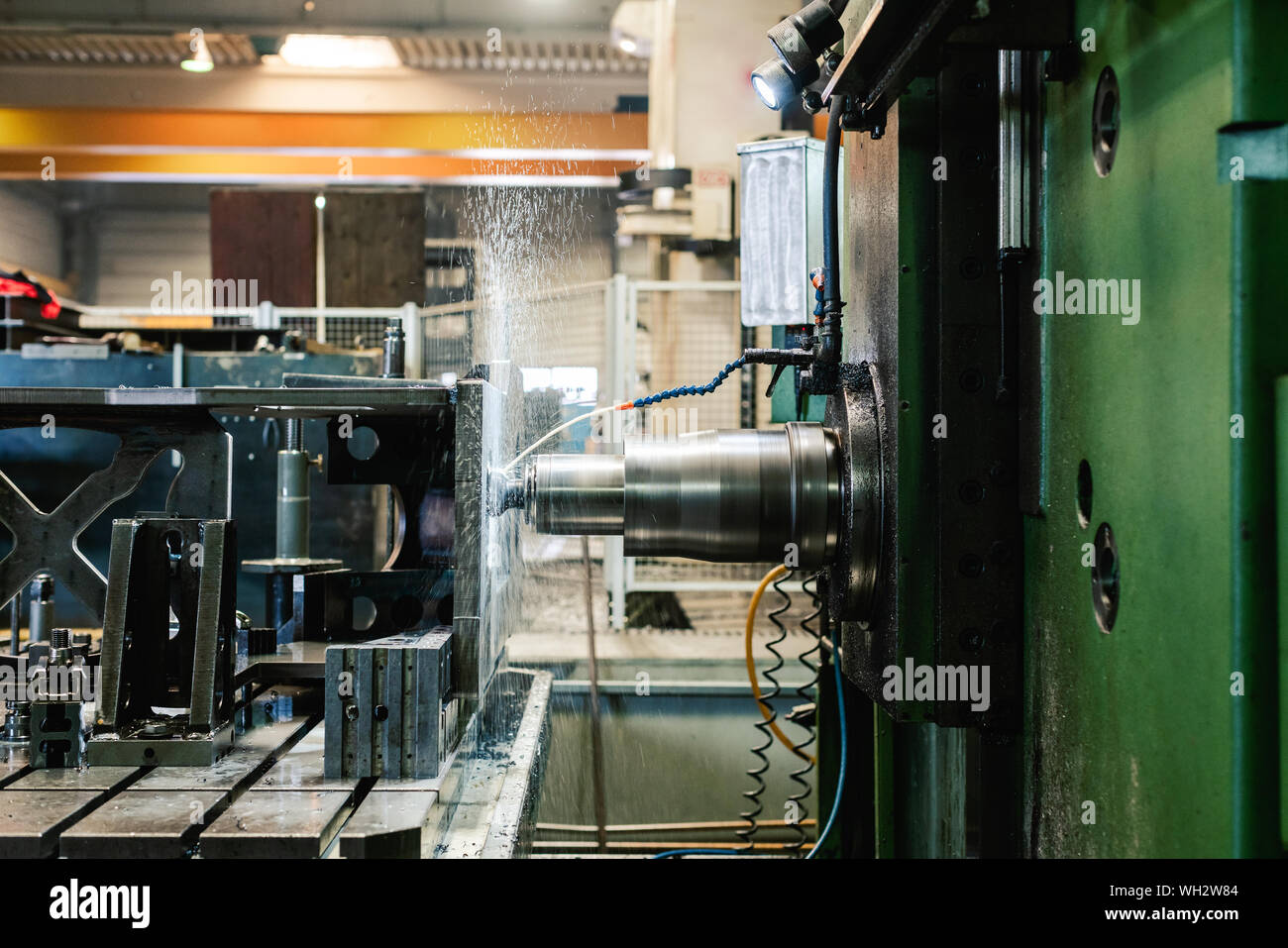 CNC milling machine in metal working factory Stock Photo - Alamy