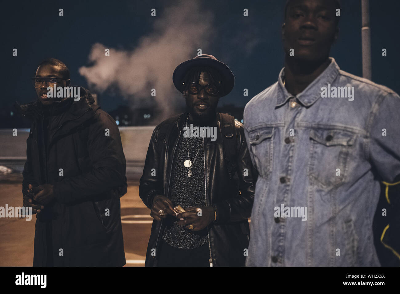 three young men posing outdoor looking camera serious - rap crew, gang ...