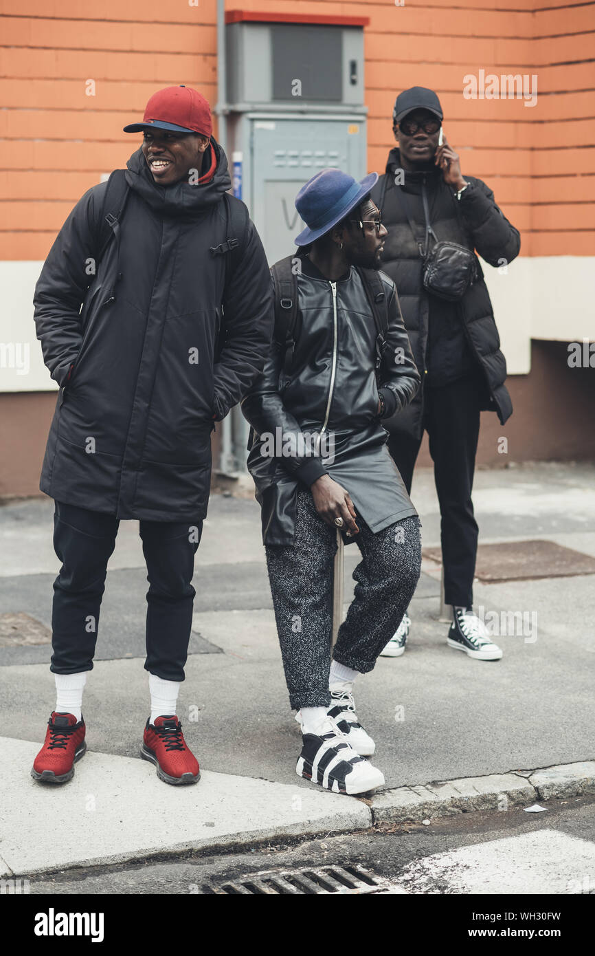 three young african men posing together in the street – relationship ...