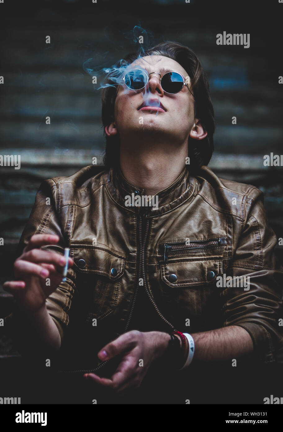 Sunglasses smoking hi-res stock photography and images - Alamy