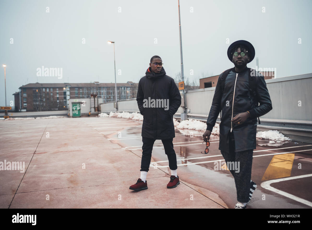 two young african men walking in the street – relationship, cheerful ...