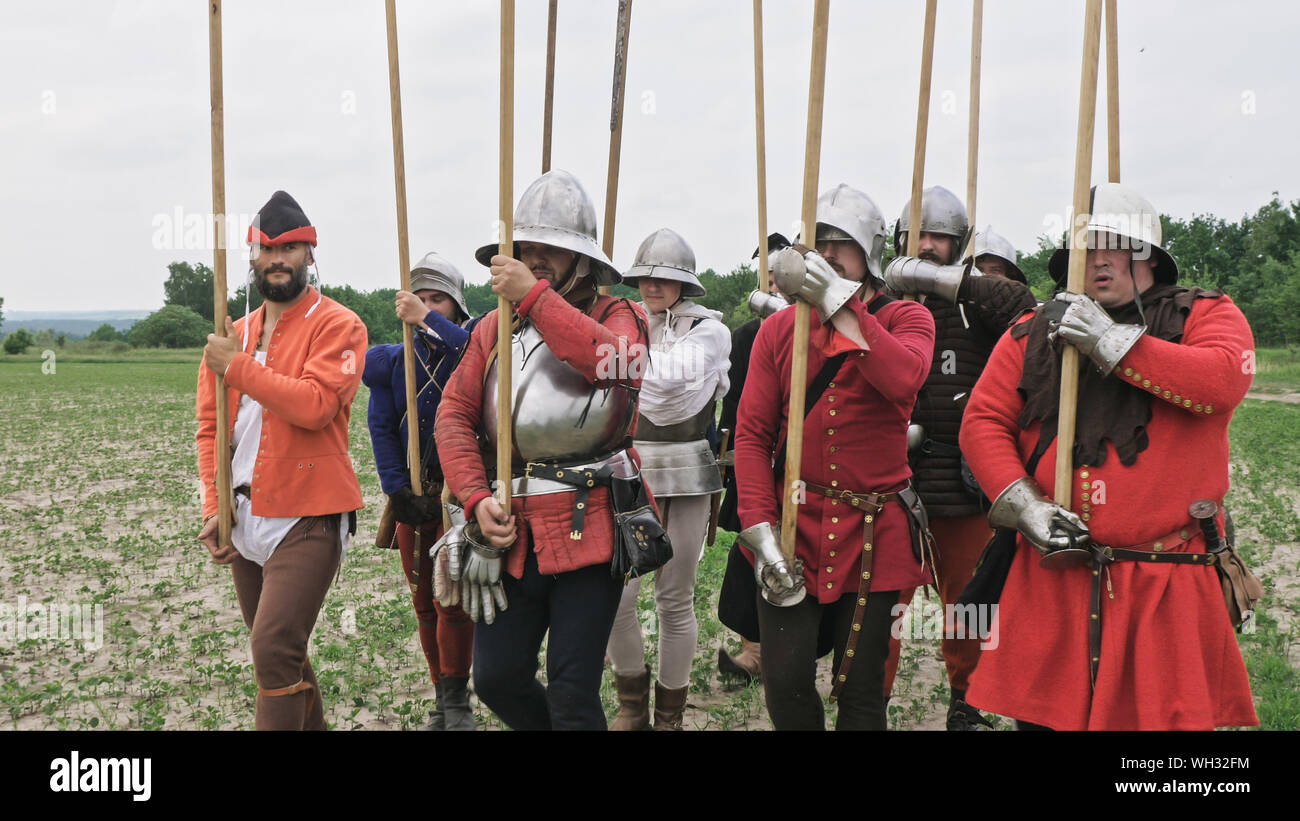 A group of medieval knights with spears preparing to attacking. Knights ...