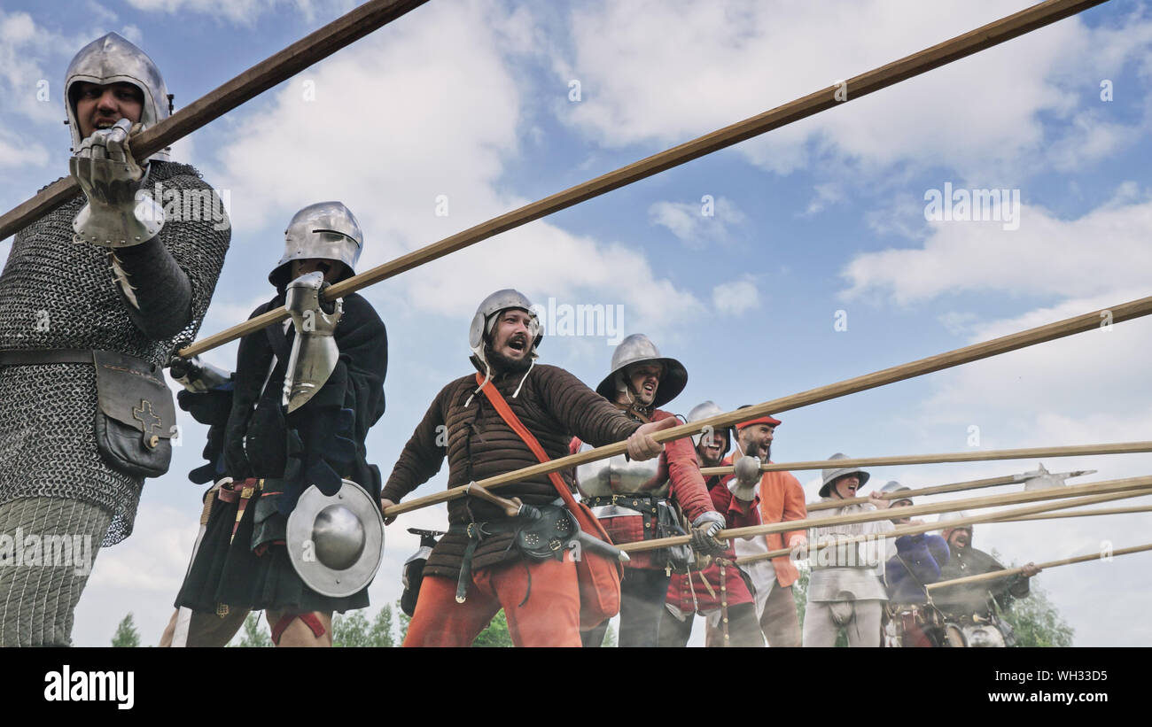 A group of medieval knights with spears preparing to attacking. Knights ...