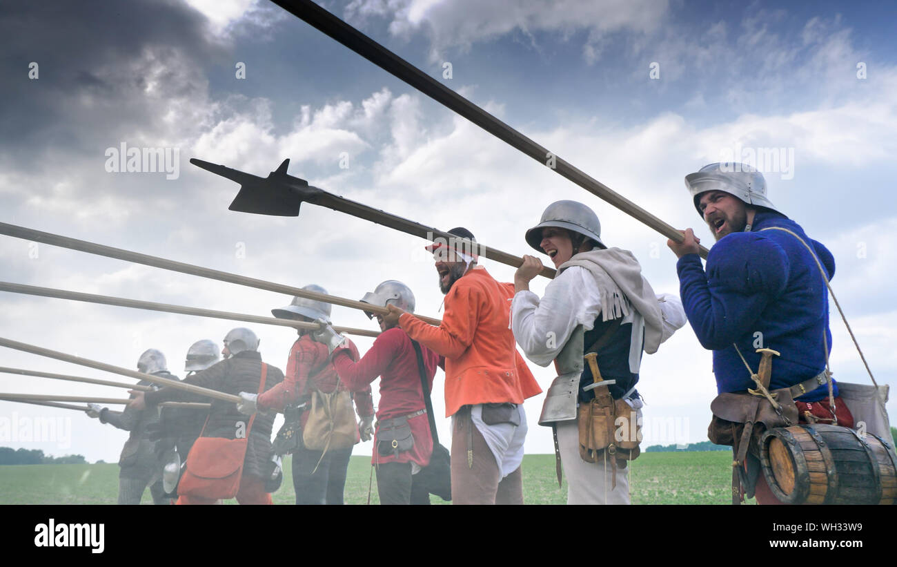 A group of medieval knights with spears preparing to attacking. Knights ...