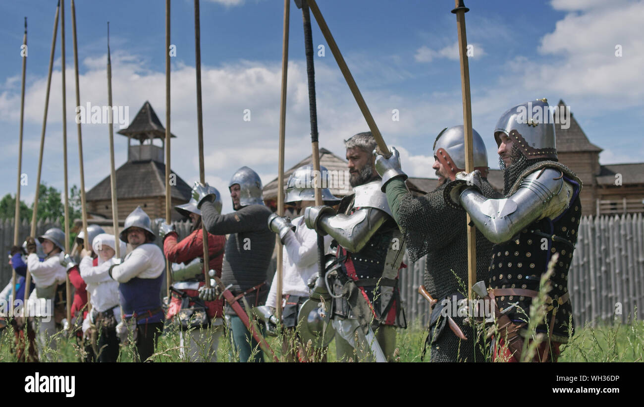 Knights in offensive. Knights defending their fortress Stock Photo - Alamy