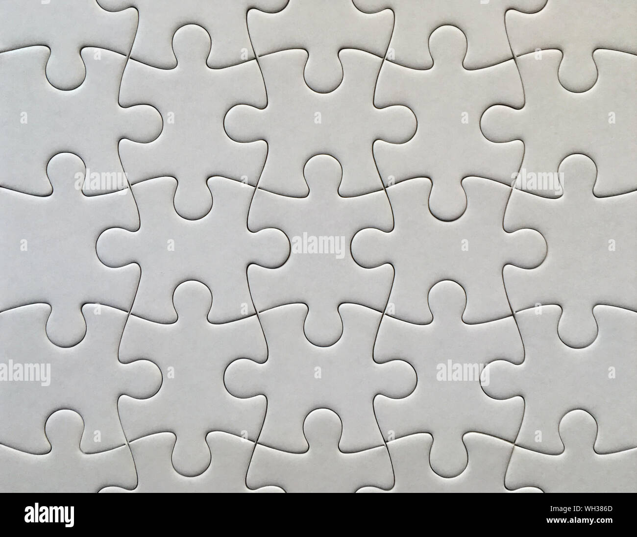 Blank jigsaw hi-res stock photography and images - Alamy