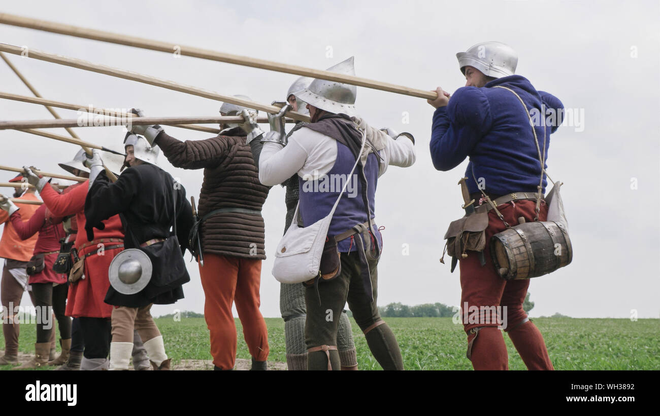 A group of medieval knights with spears preparing to attacking. Knights ...