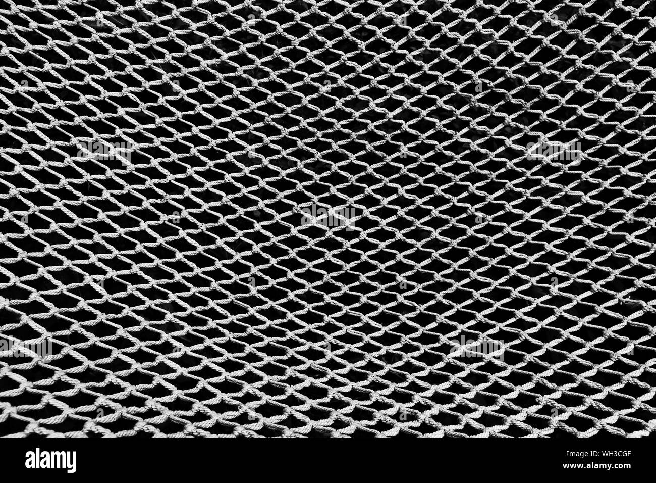 hammock rope knitted mesh texture, black and white photo Stock Photo ...