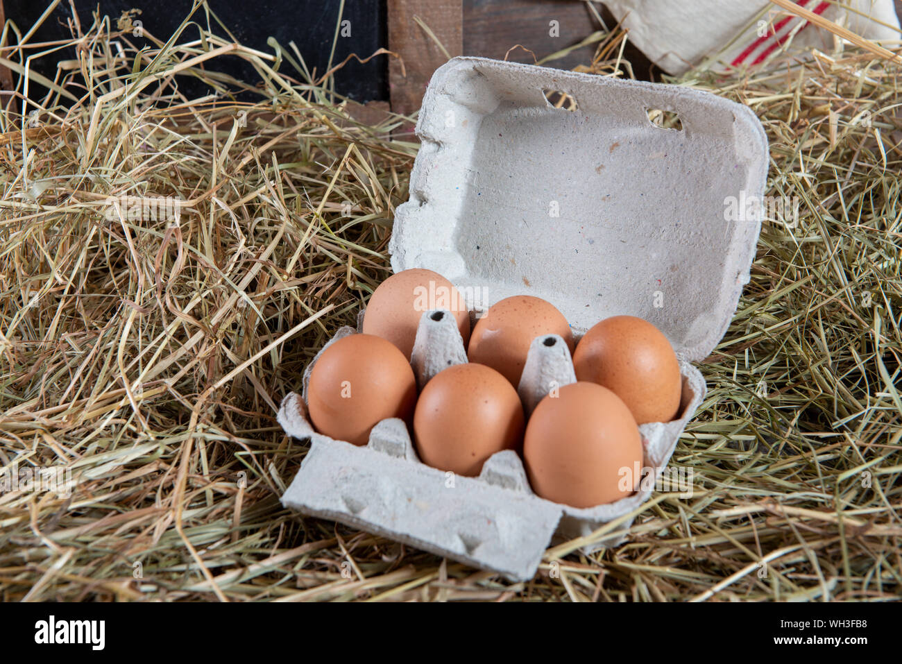 six eggs in the package on the straw Stock Photo - Alamy