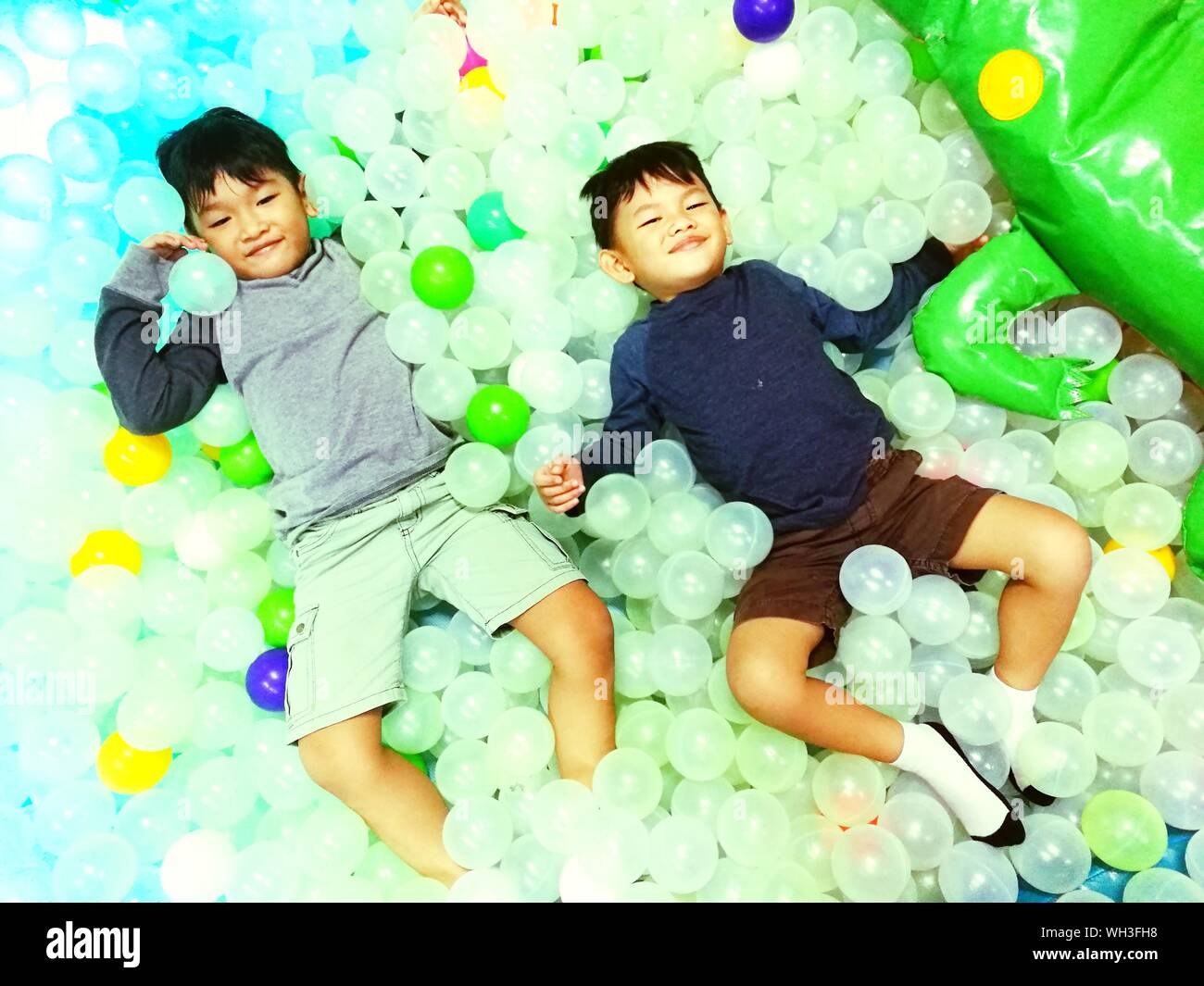 Boys Lying Pool High Resolution Stock Photography and Images - Alamy