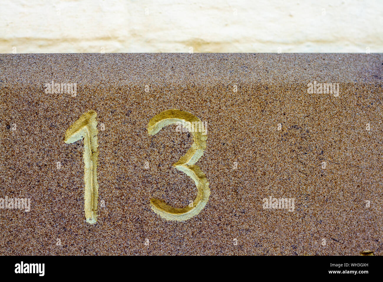 Gold lettering in stone hi-res stock photography and images - Alamy
