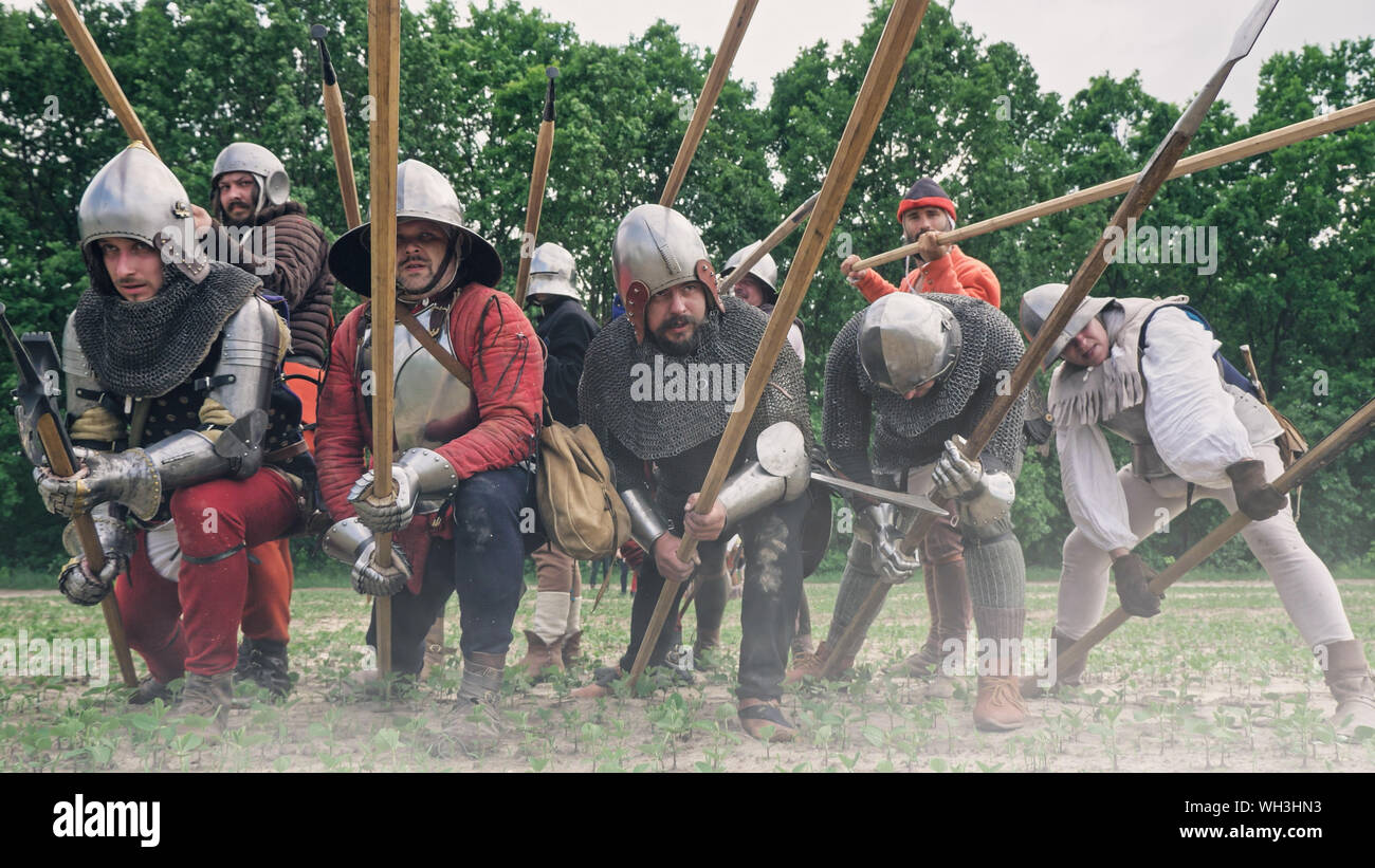 Warriors with fighting with spears in a battle. Warriors in attack ...