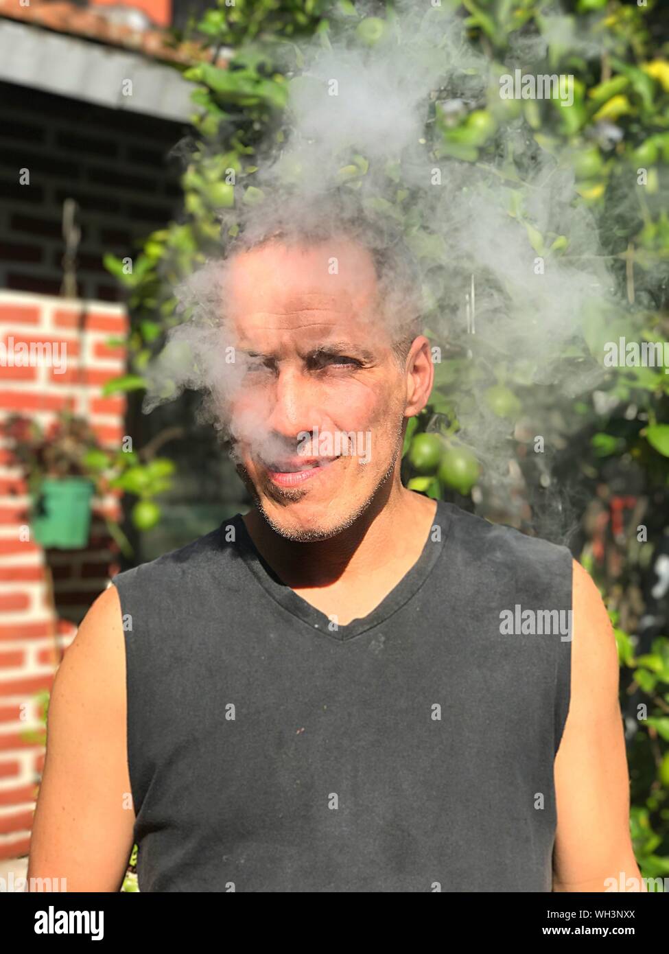 Portrait man smoking hi-res stock photography and images - Alamy