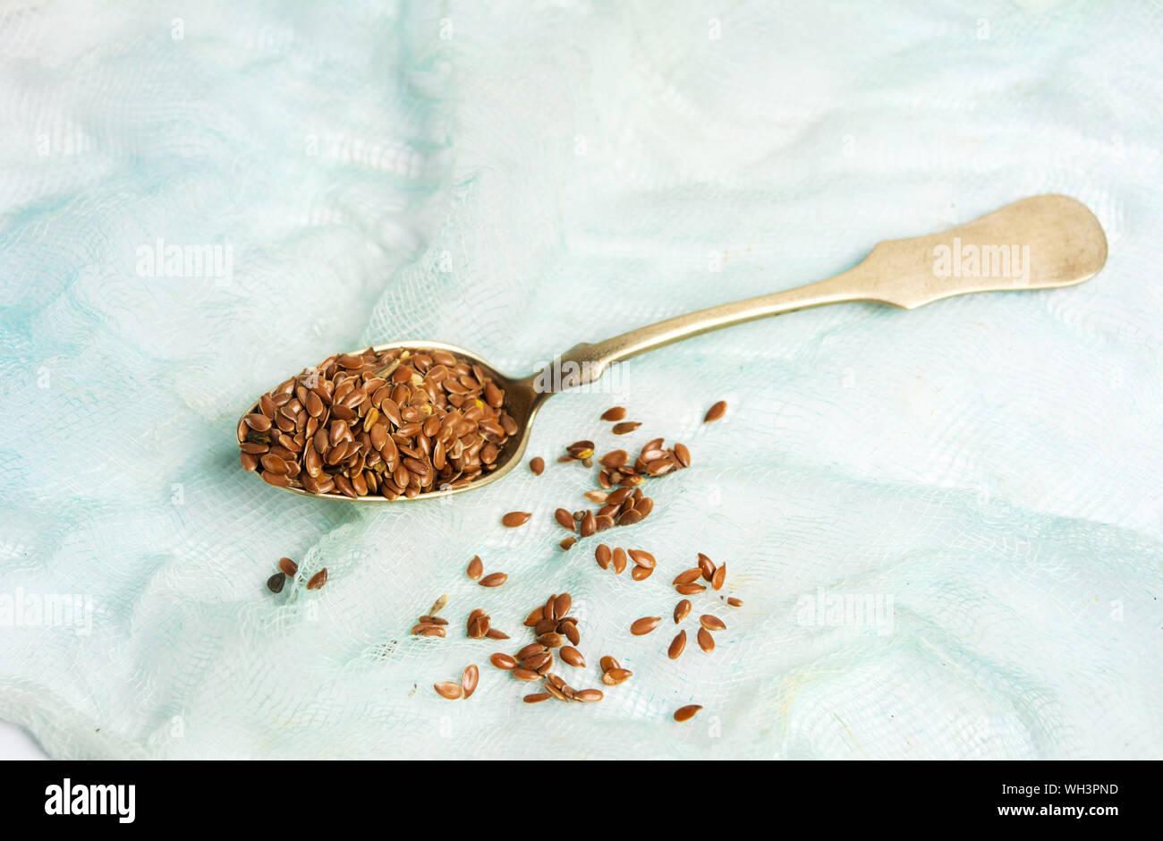 Linen flax seeds on a spoon, healthy food abstract Stock Photo - Alamy